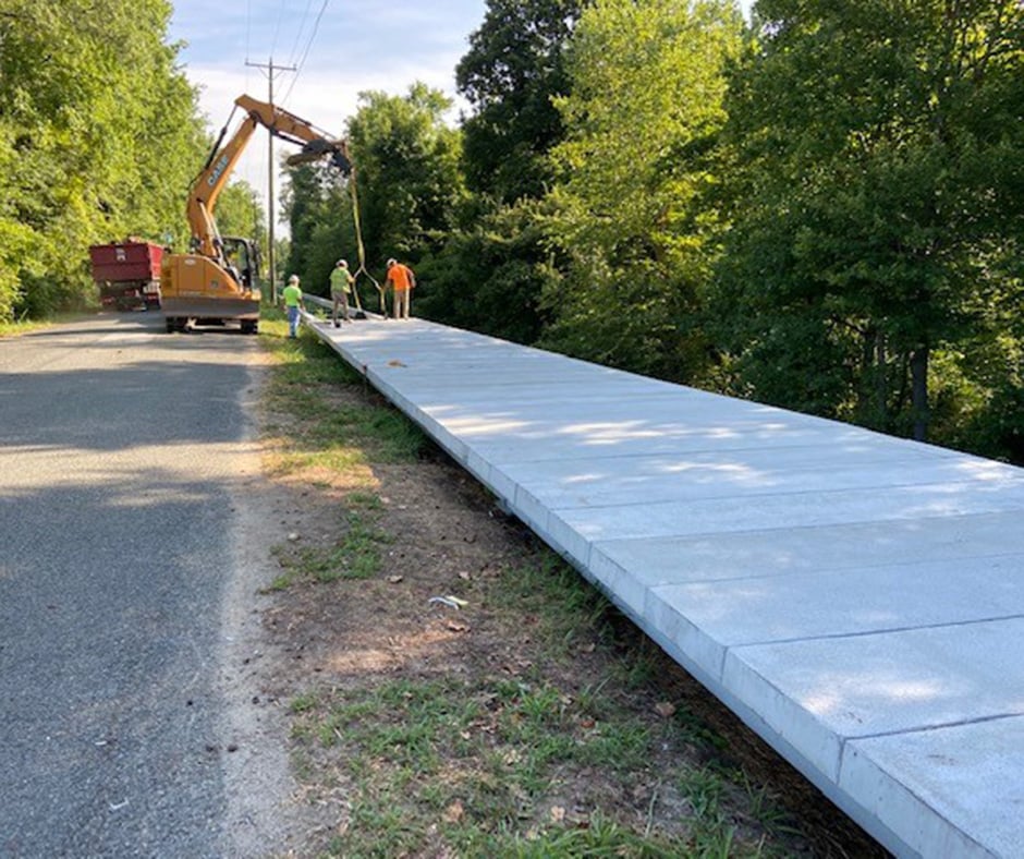 Helical Pile Foundation Engineered to Support Hillside Boardwalk Trail