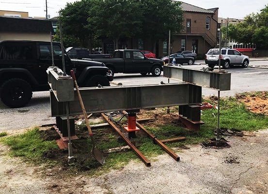 New Construction Foundation with Grouted Helical Piles in Constrained Site