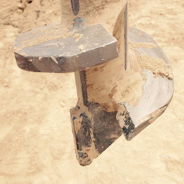 What to do when the soil is too dense or rocky for helical piles